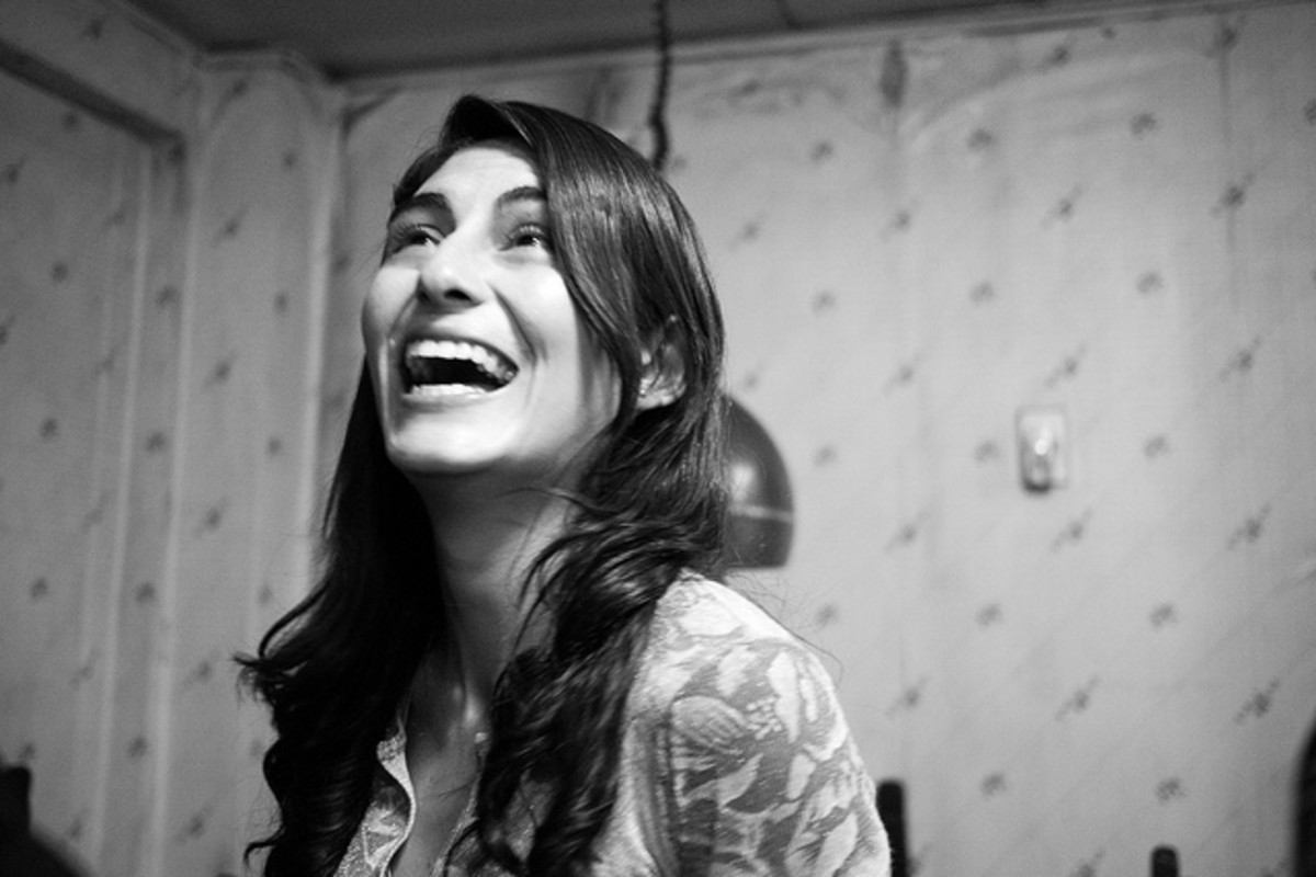 Which makes you happier: laughing, smiling, or howling? | Discover Magazine